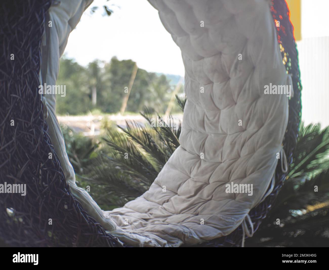 Large swings with white seats Stock Photo - Alamy