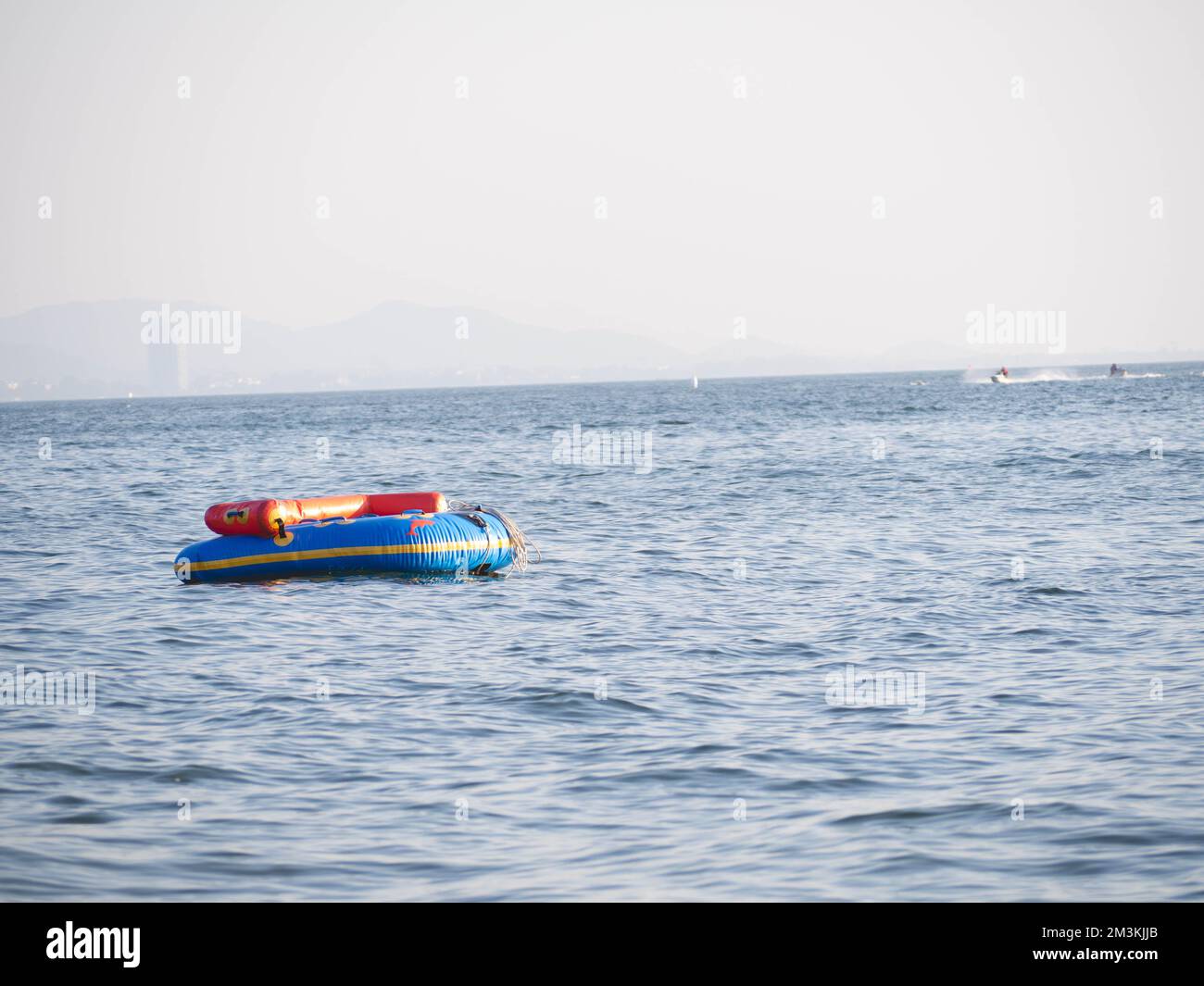 A rubber boat floating in the sea Stock Photo - Alamy
