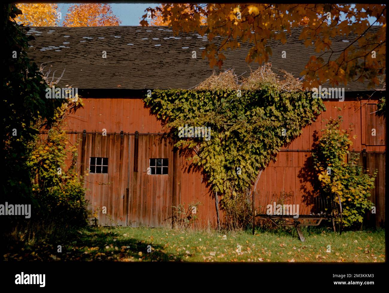 Partial view of side of a red barn , Barns. Edmund L. Mitchell ...