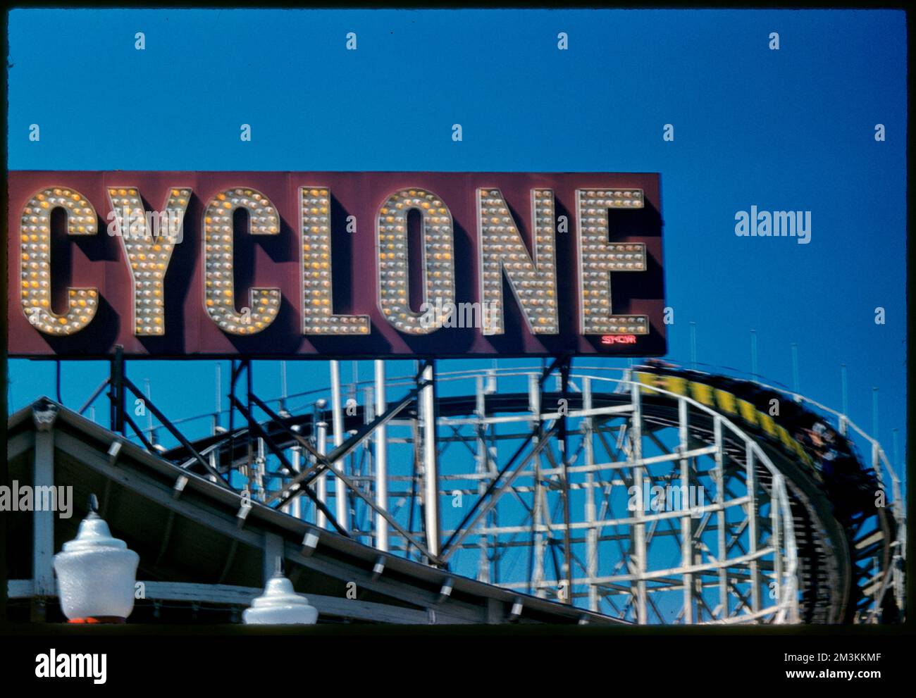 Partial view of roller coaster with sign 'Cyclone' , Amusement parks ...
