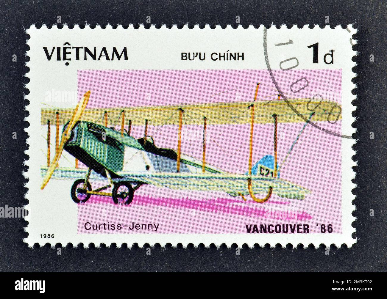 Cancelled postage stamp printed by Vietnam, that shows Curtiss JN-4 ...