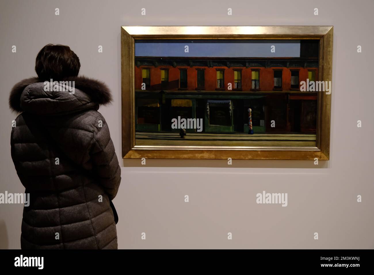 A visitors enjoying "Early Sunday Morning" 1930 by Edward Hopper ...