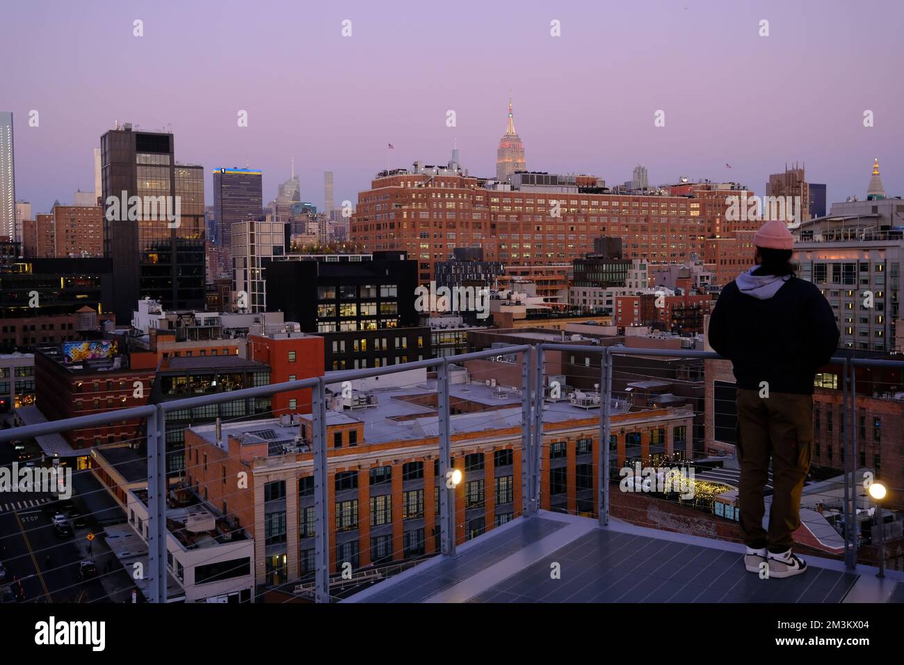A visitor on the outdoor terrace of Whitney Museum of American Art in ...