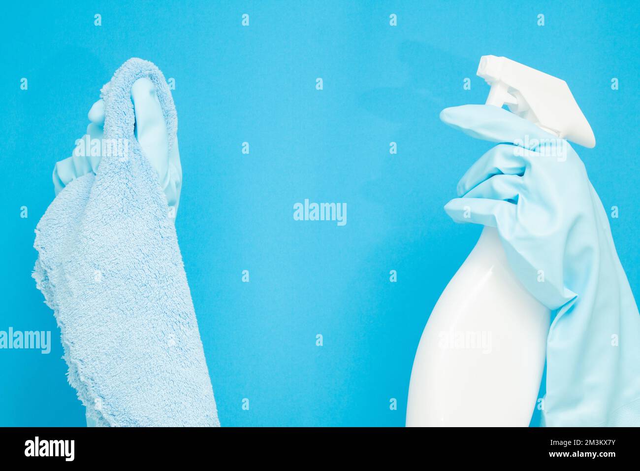 Cleaning concept, Hand in rubber gloves to holding spray bottle and ...