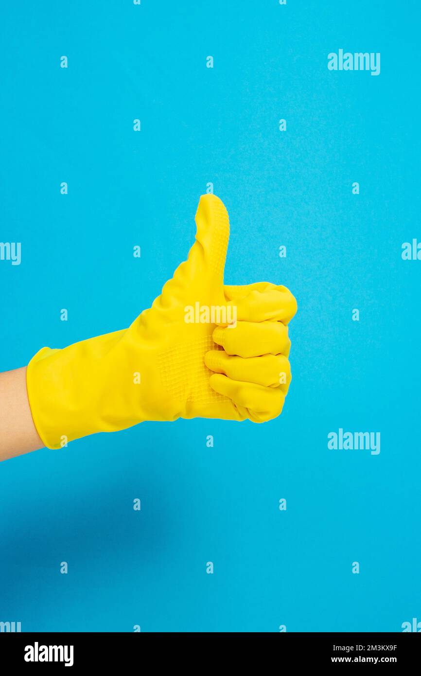 Cleaning concept, Hand in rubber gloves and doing thumb up symbol ...