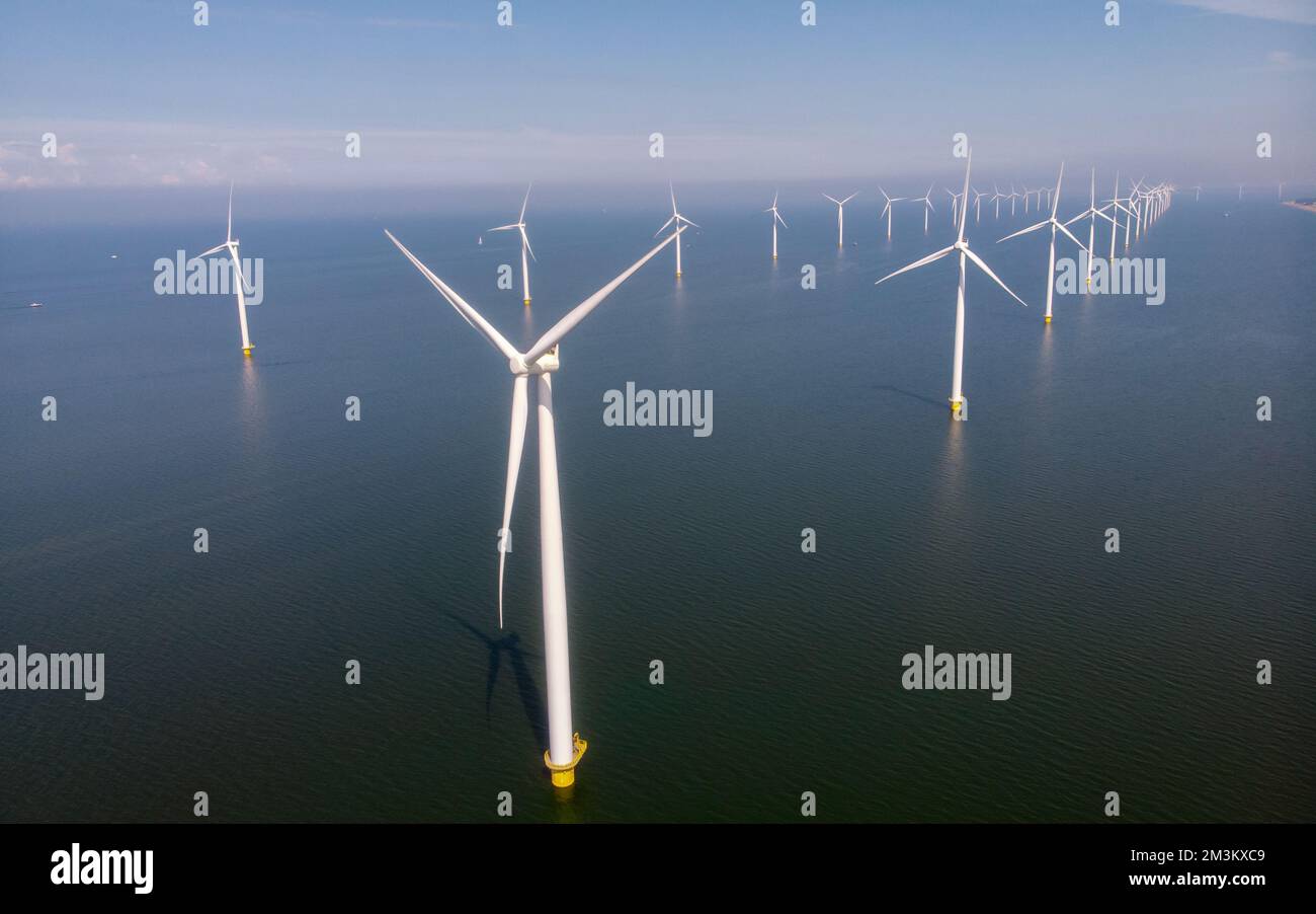 Windmill park with windmill turbines generating electric in the ...