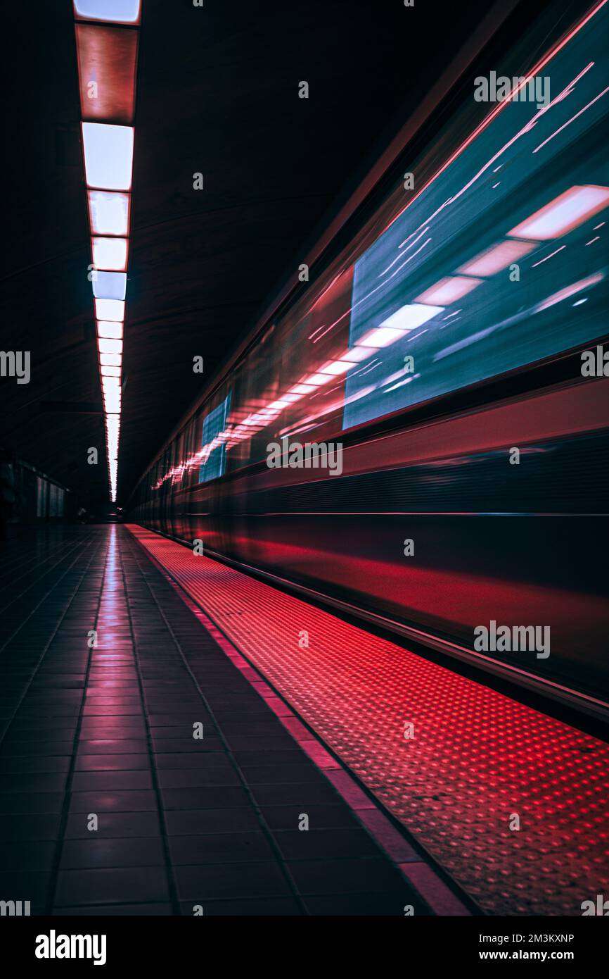 A train arriving in metro station Stock Photo - Alamy