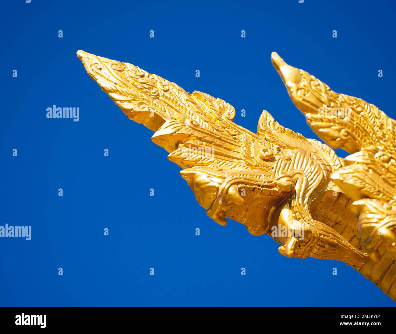 Golden Naga head sculpture, an animal in Thai religious literature ...
