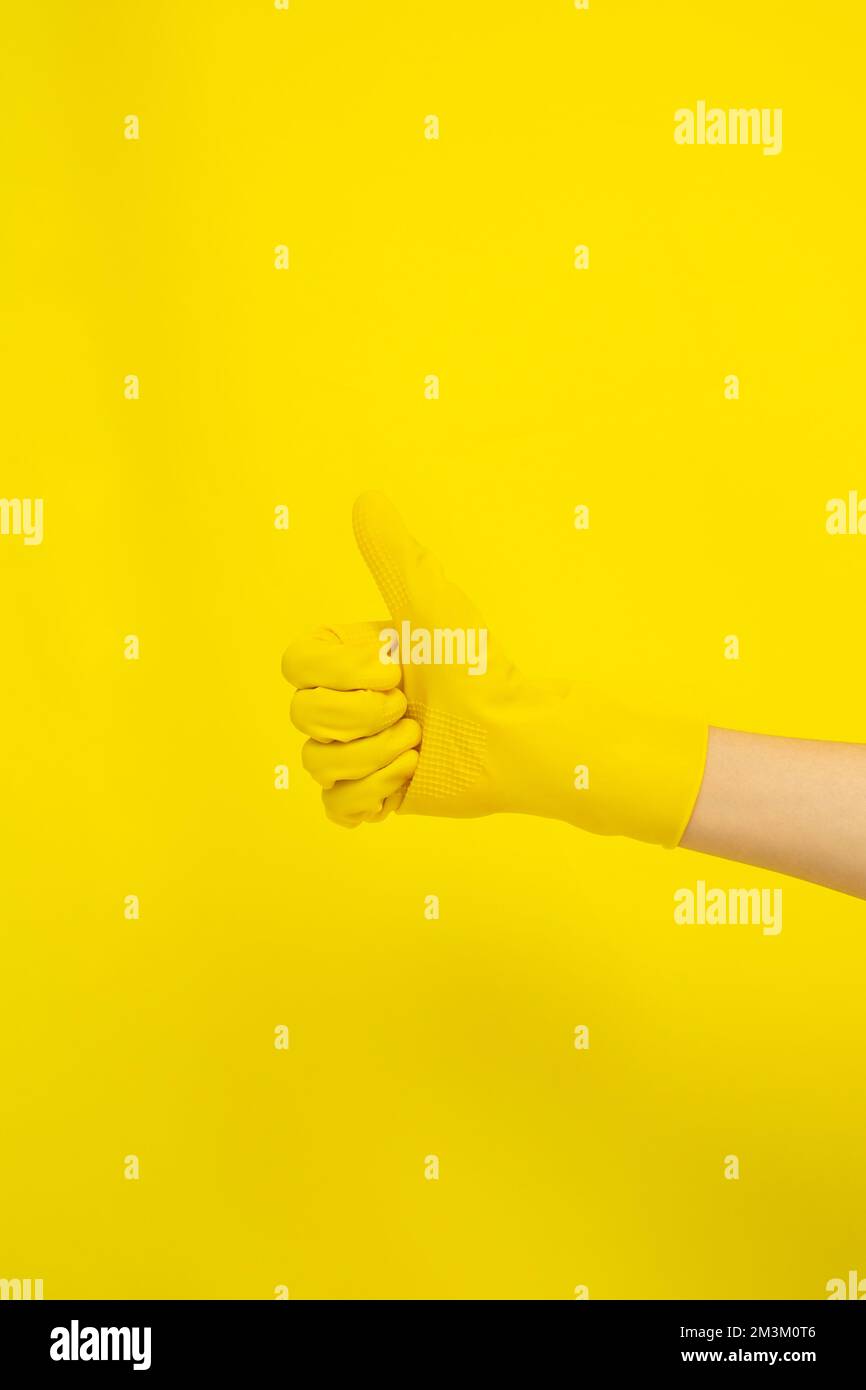Cleaning concept, Hand in rubber gloves and doing thumb up symbol ...
