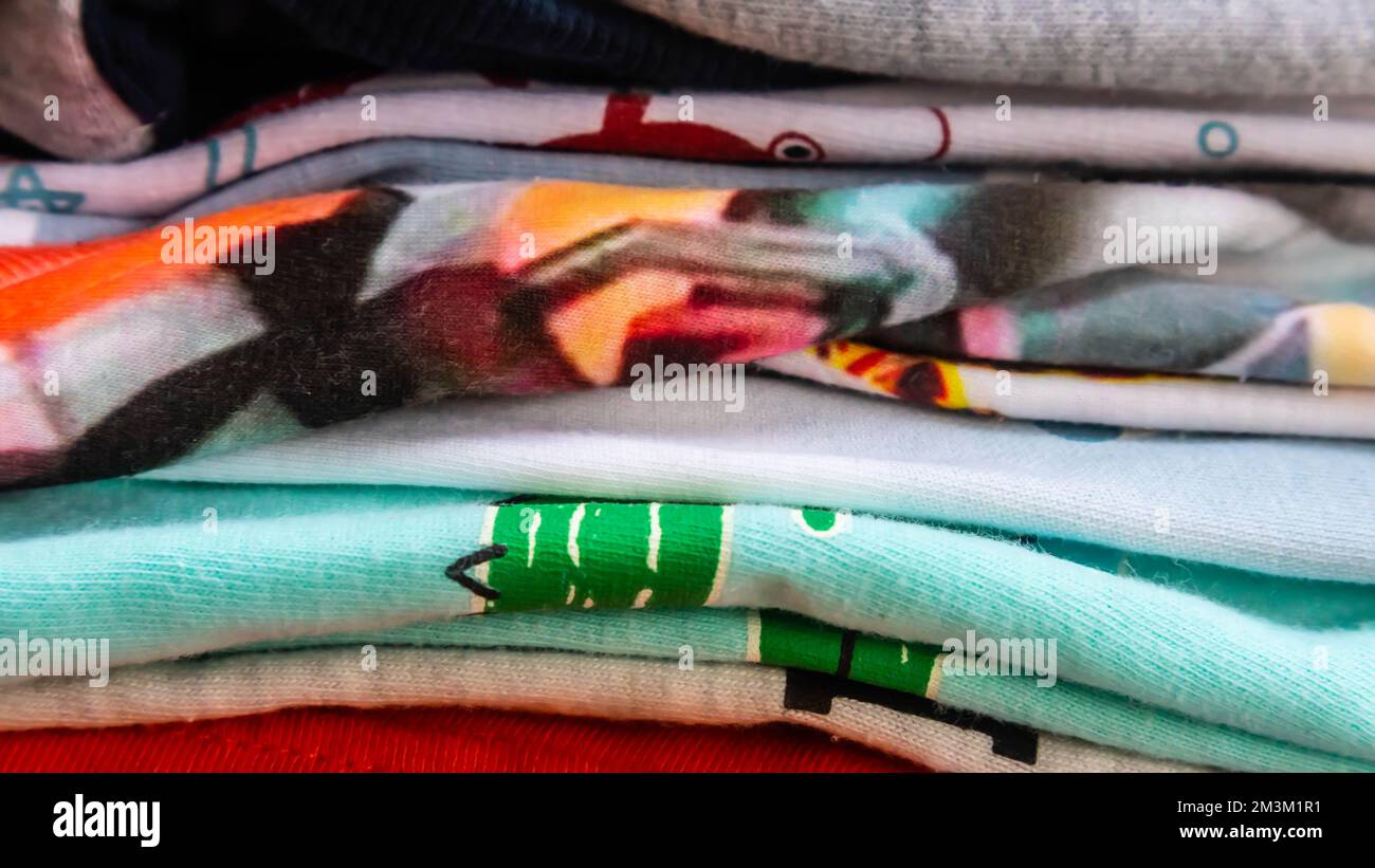 pile of clothes as background Stock Photo - Alamy