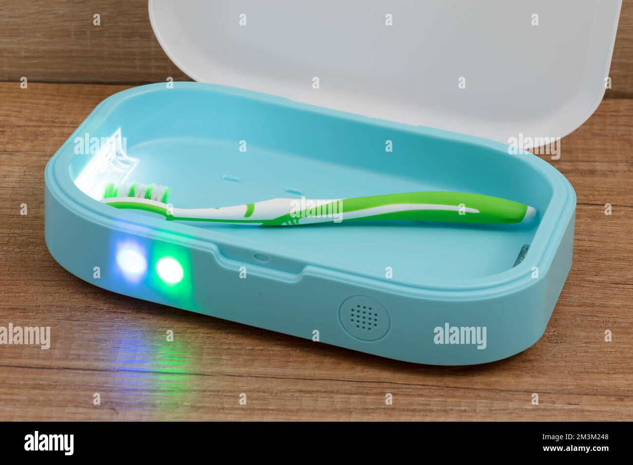 A tooth brush on UV sterilizer for phone Stock Photo - Alamy
