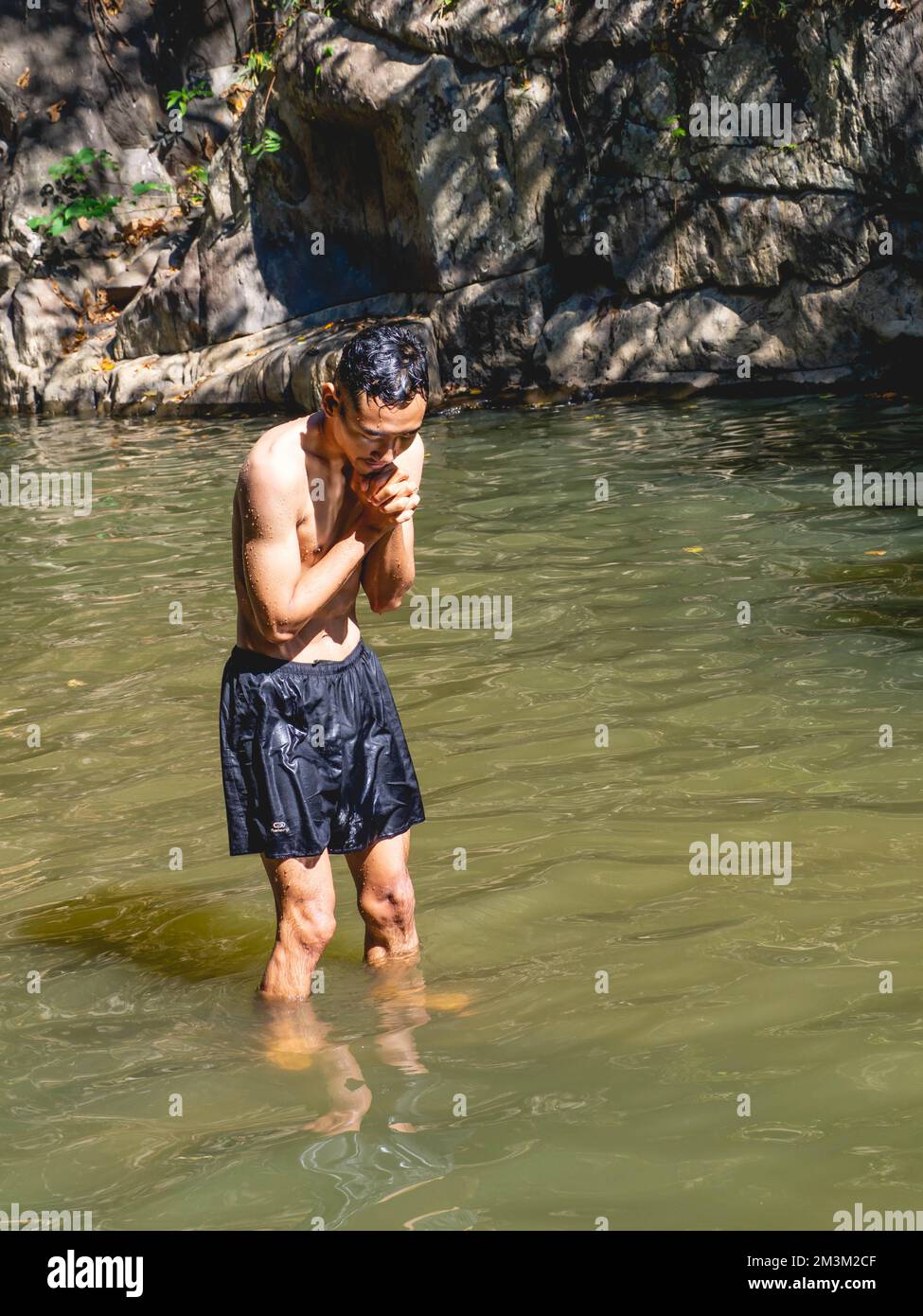 A man who is cold from swimming Stock Photo - Alamy