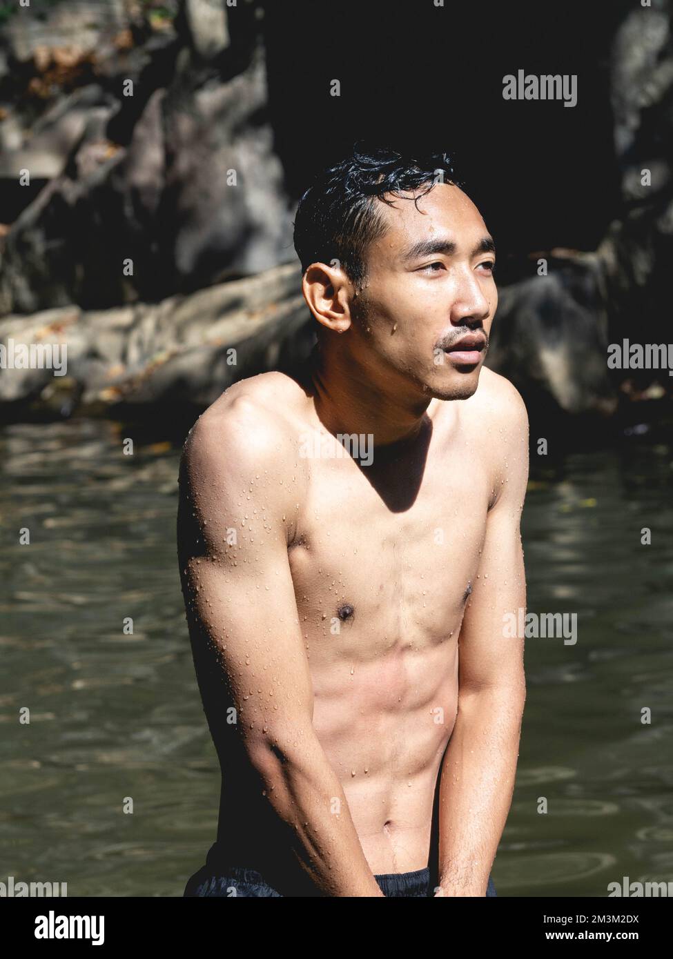 A man who is cold from swimming Stock Photo - Alamy
