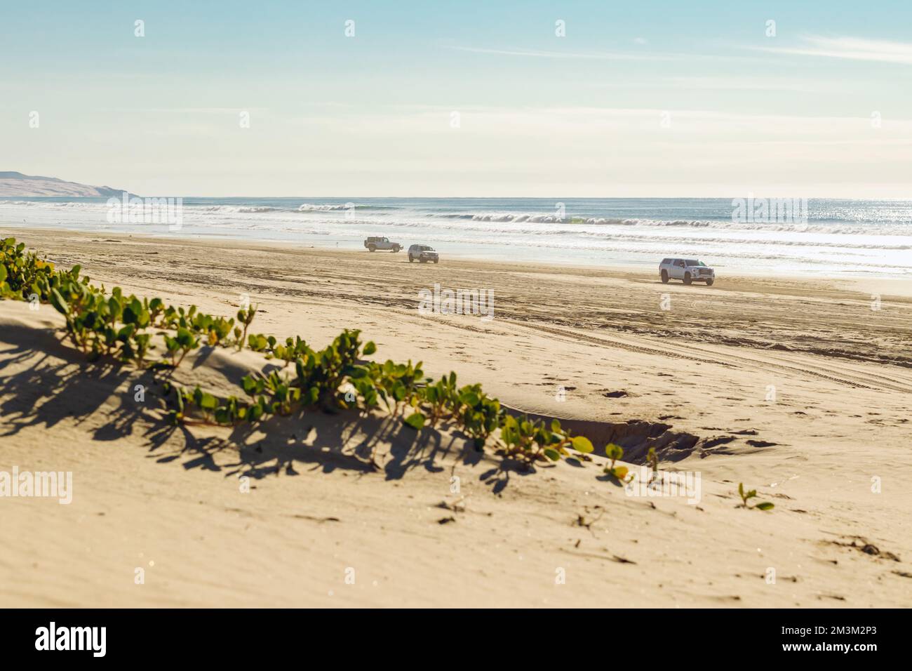 Oceano, California, USA -December 14, 2022. Cars on the beach. Oceano ...