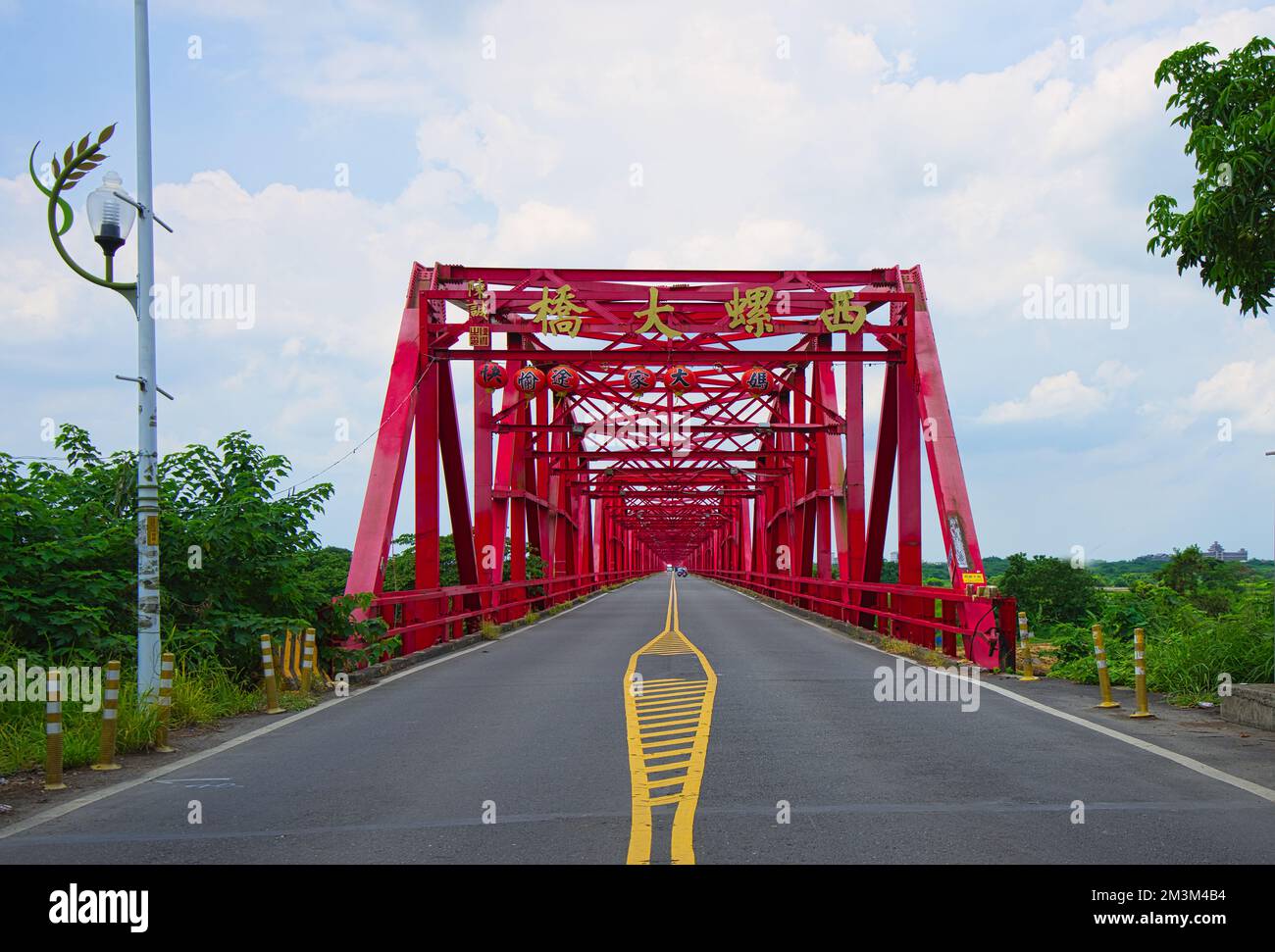 The Xiluo Bridge is a red steel bridge with concrete piers. This bridge ...