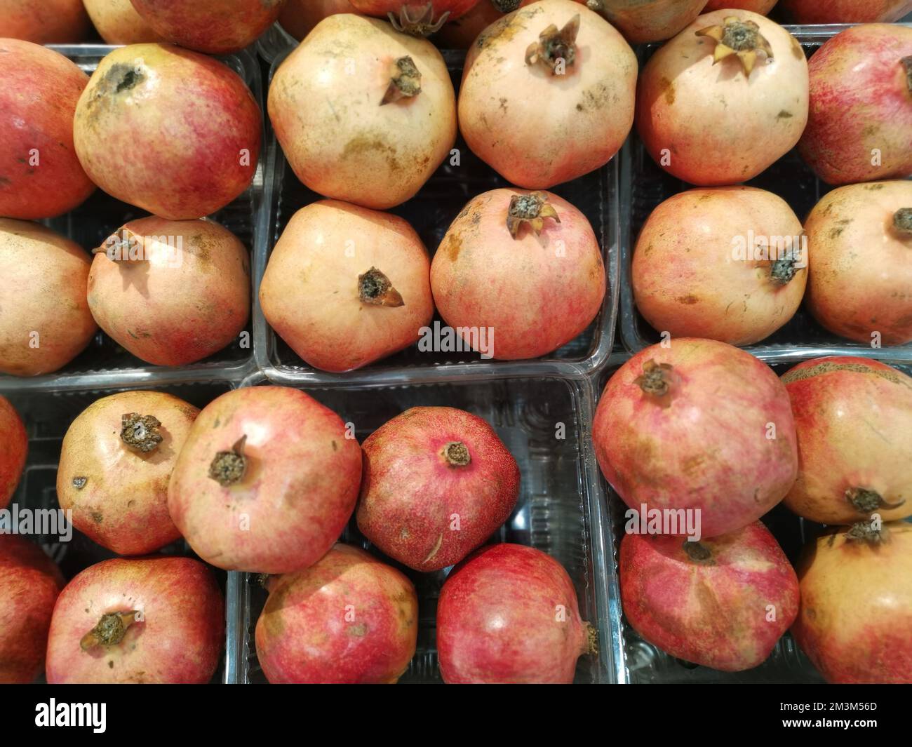 lots of the pomegranate the deciduous shrub fruits Stock Photo - Alamy