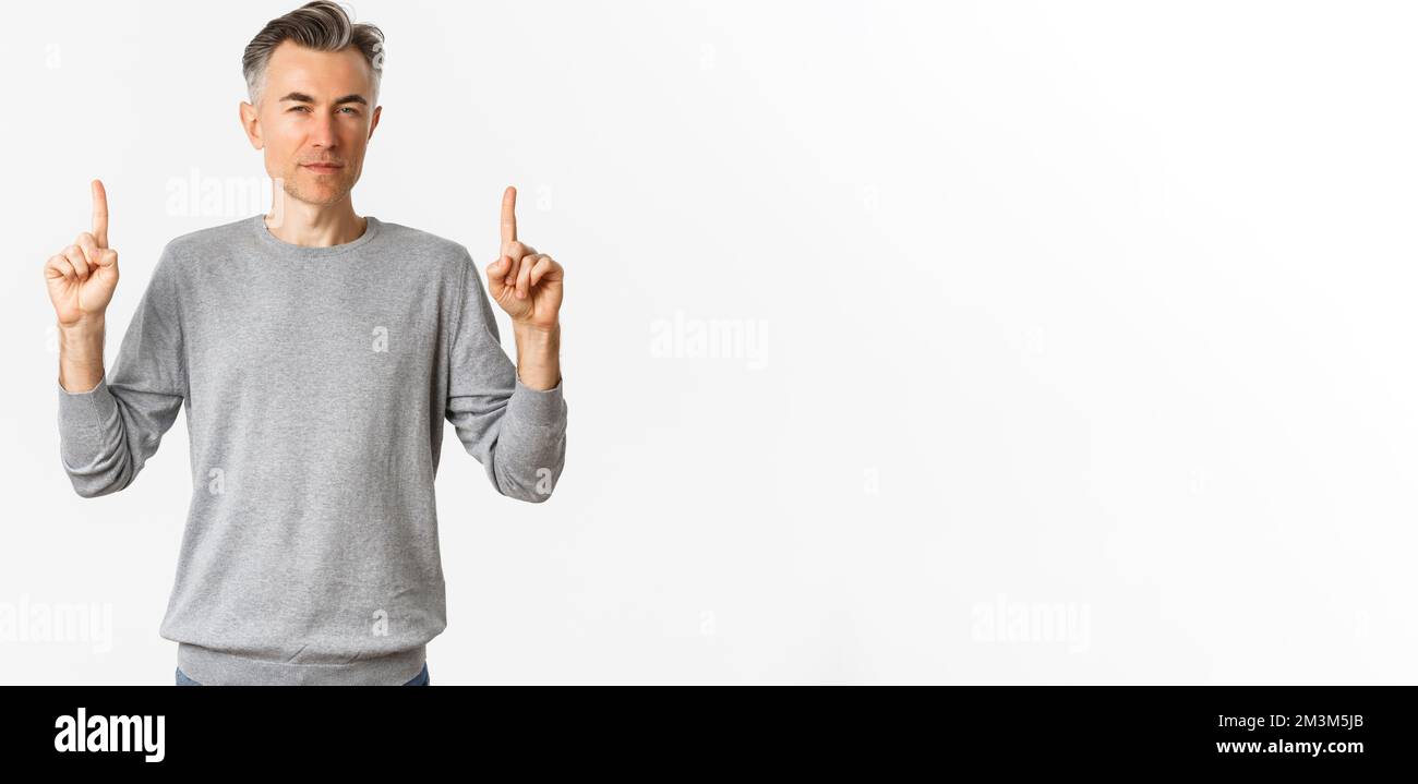 Image of thoughtful and unsure adult man, squinting hesitant while ...