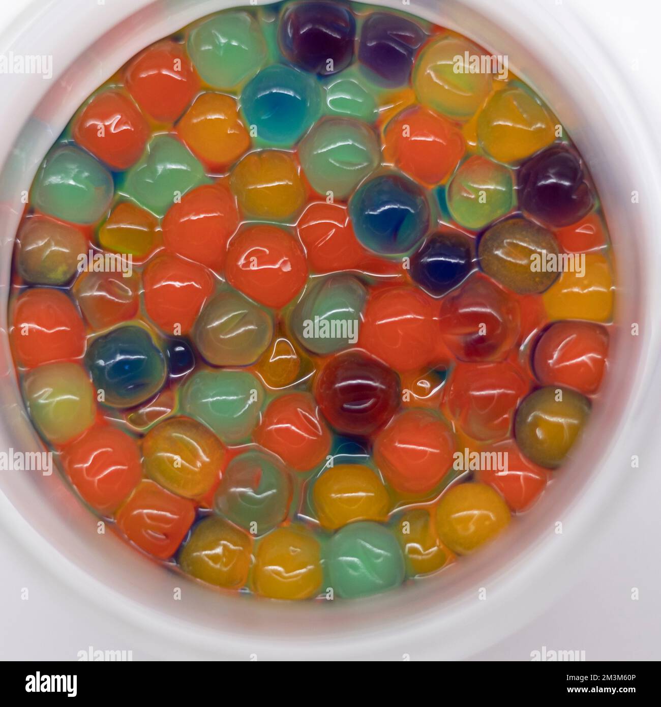 water beads pearls in many different colours inside a circle ...