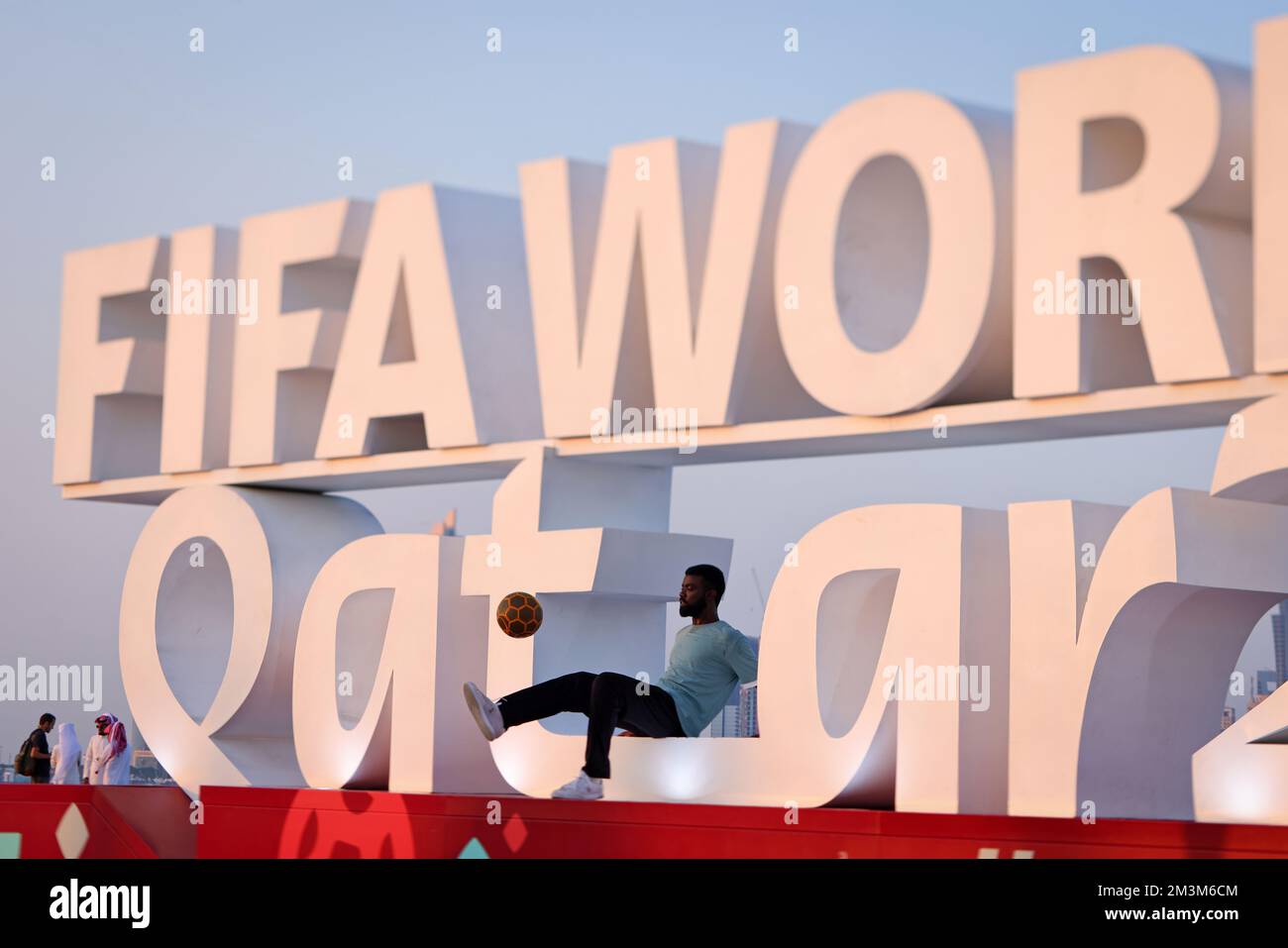 People on a sign of the FIFA World Cup Qatar 2022 FIFA President ...