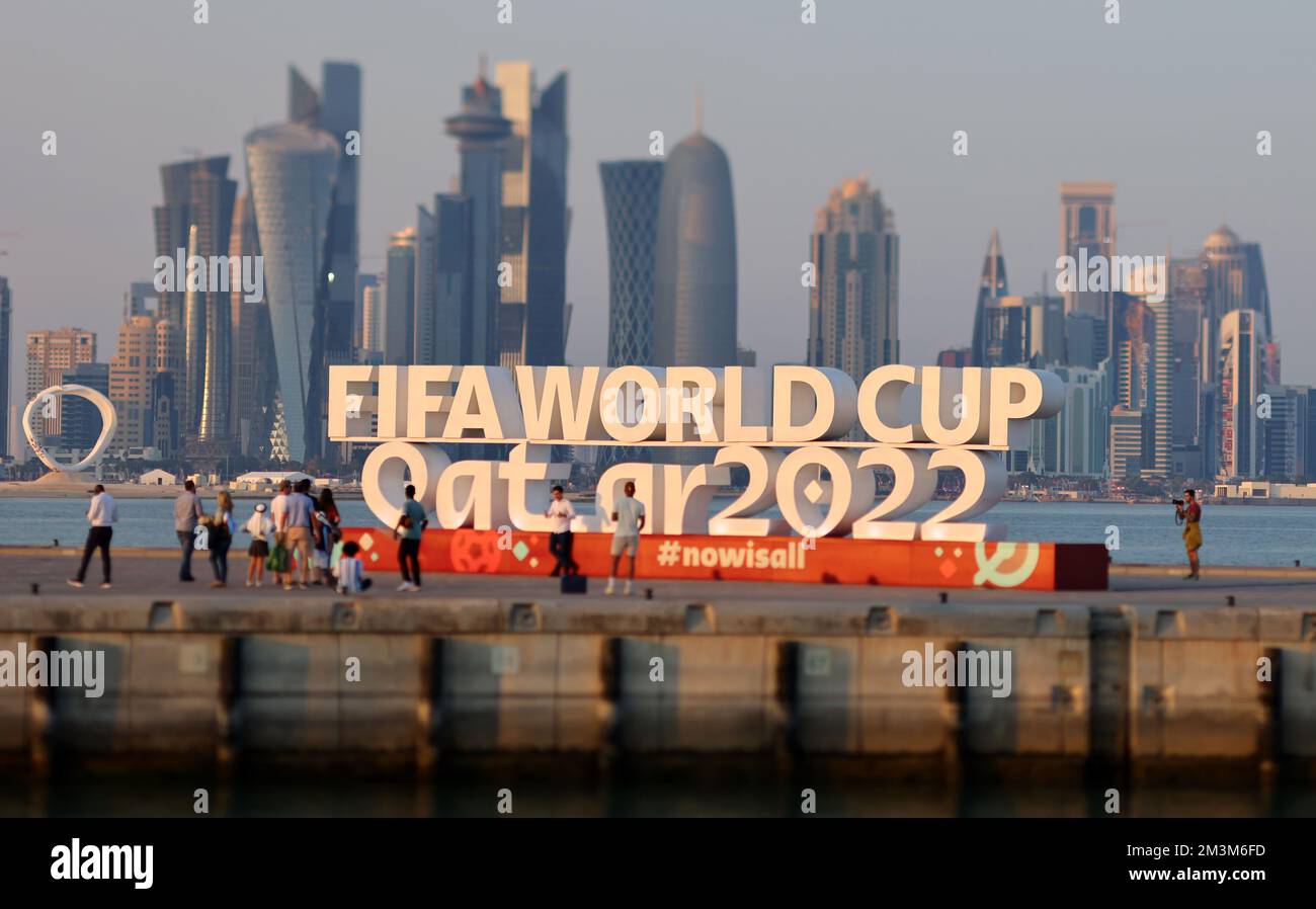 People on a sign of the FIFA World Cup Qatar 2022 FIFA President ...
