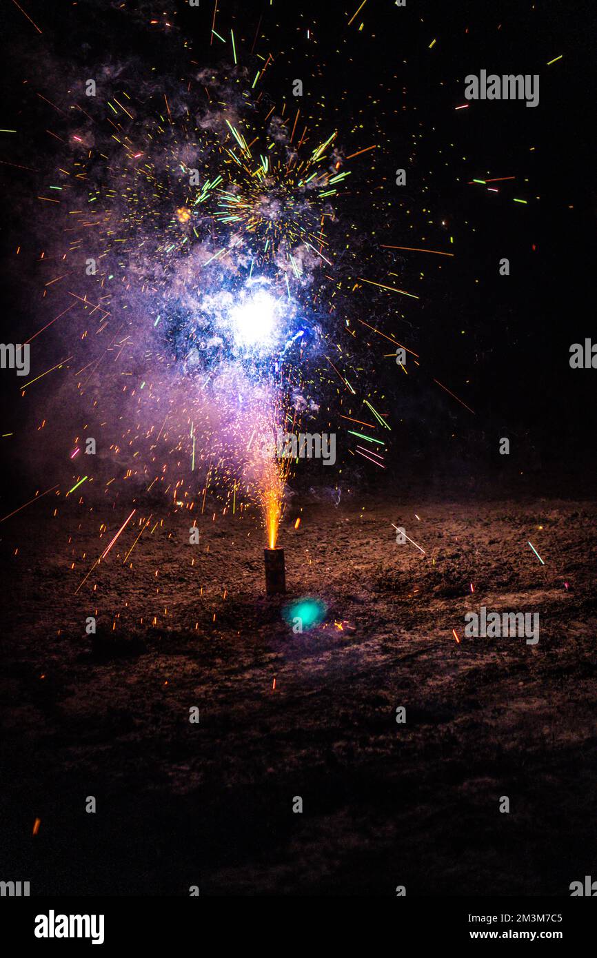 Boy holding fireworks sparklers hi-res stock photography and images - Alamy