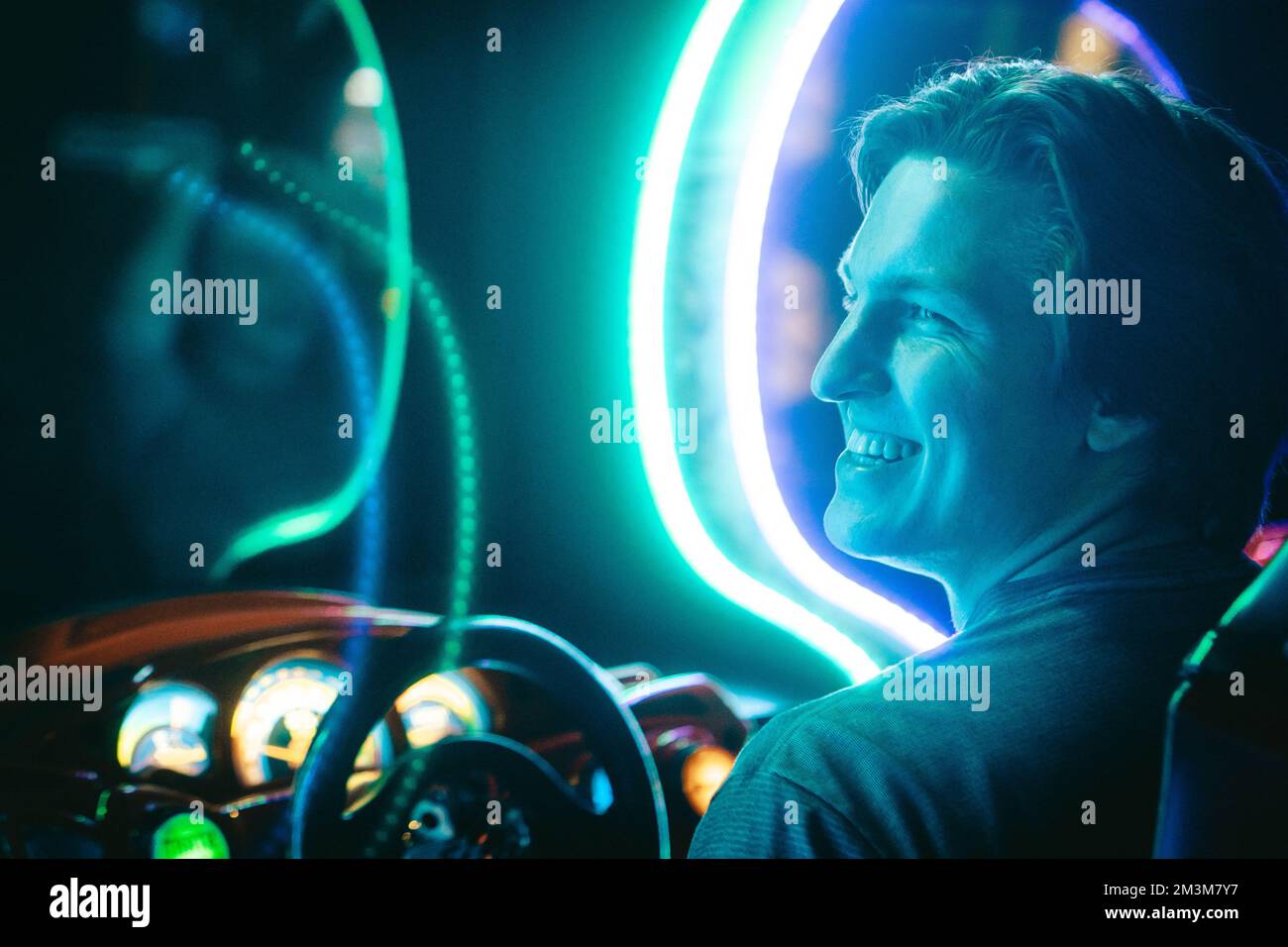 playing in an arcade Stock Photo - Alamy