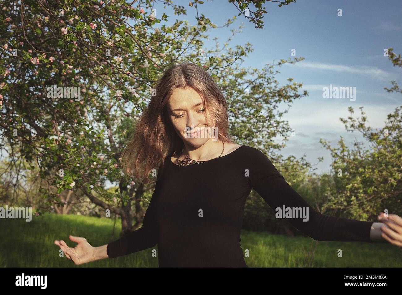 Woman spinning smiling in nature hi-res stock photography and images ...