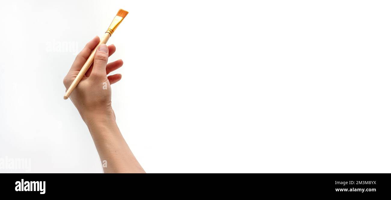 Woman right hand holding paintbrush isolated on white background Stock ...