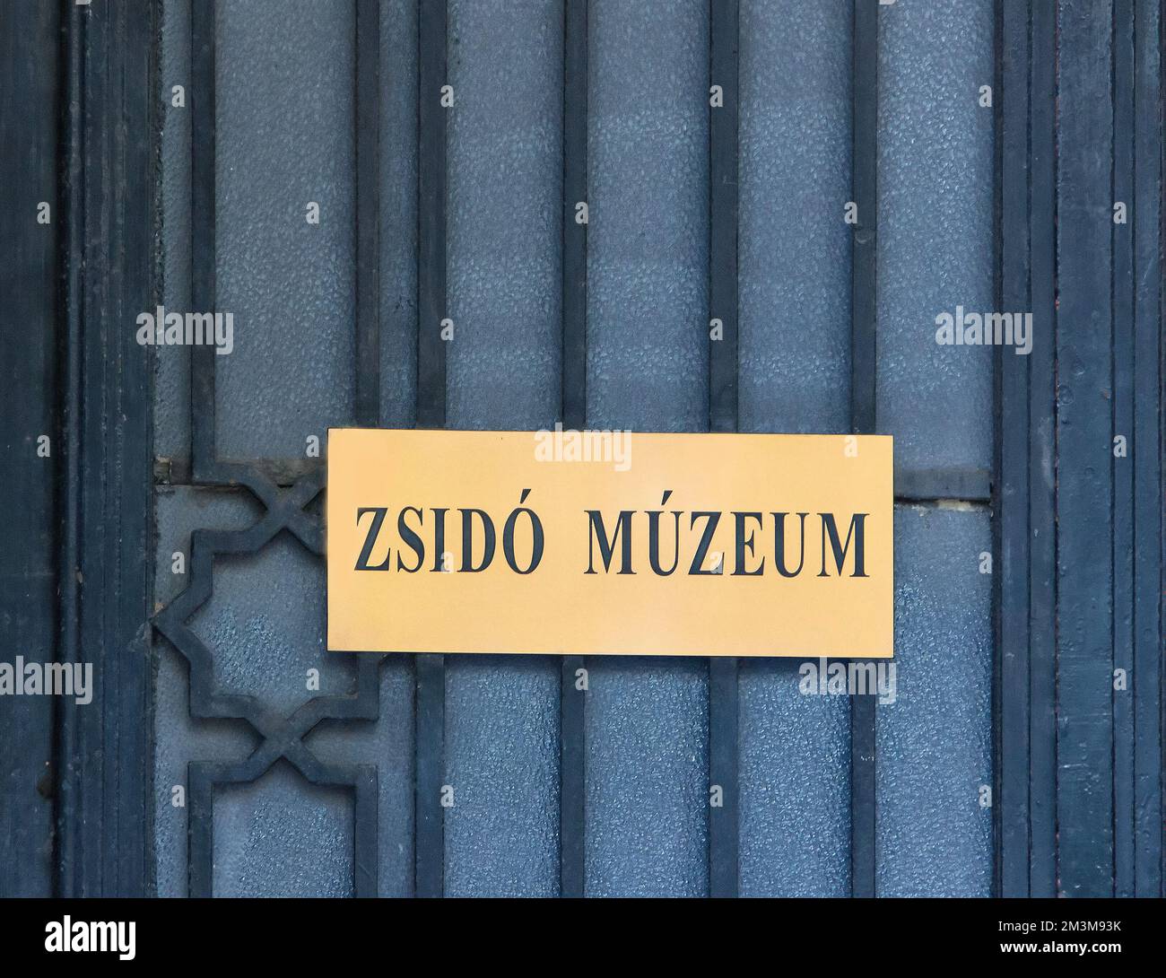 Sign on the door of the Jewish Museum, which is located next door to ...