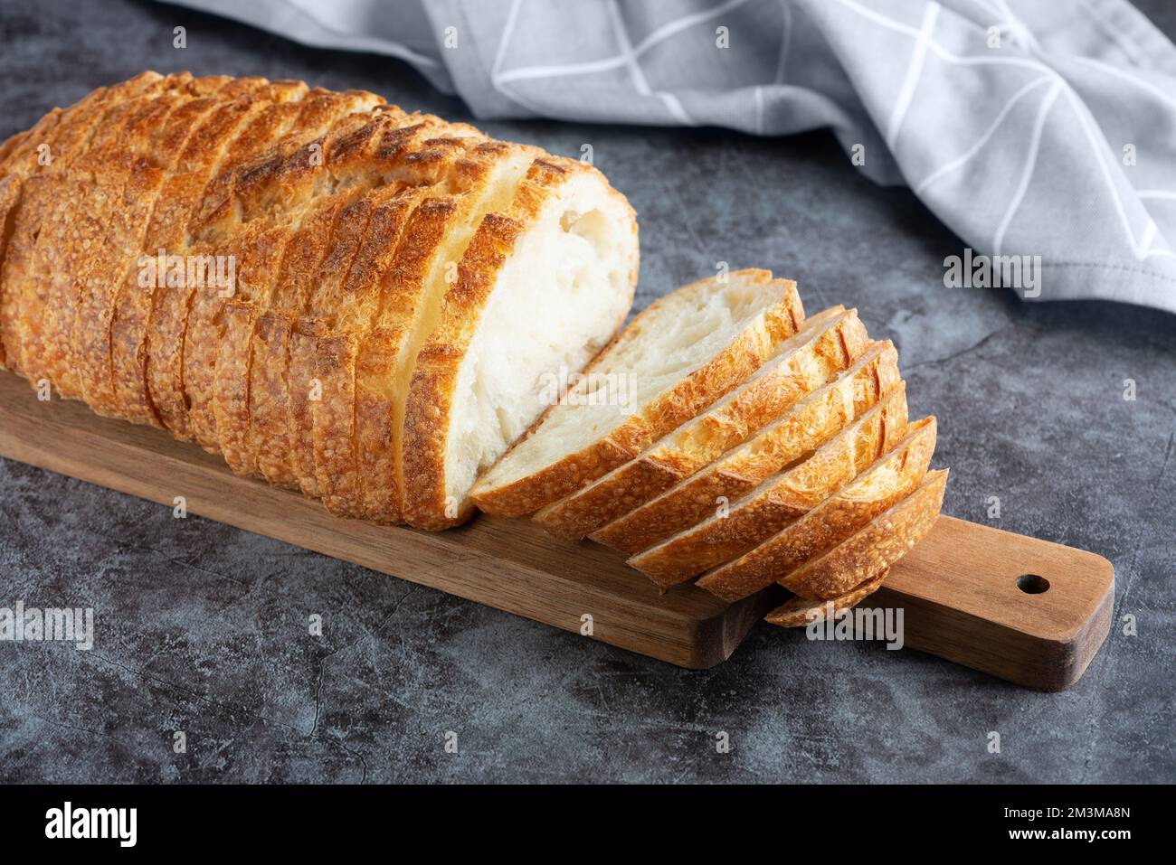 Fresh white loaf of bread on gray cement background. Top view Stock ...