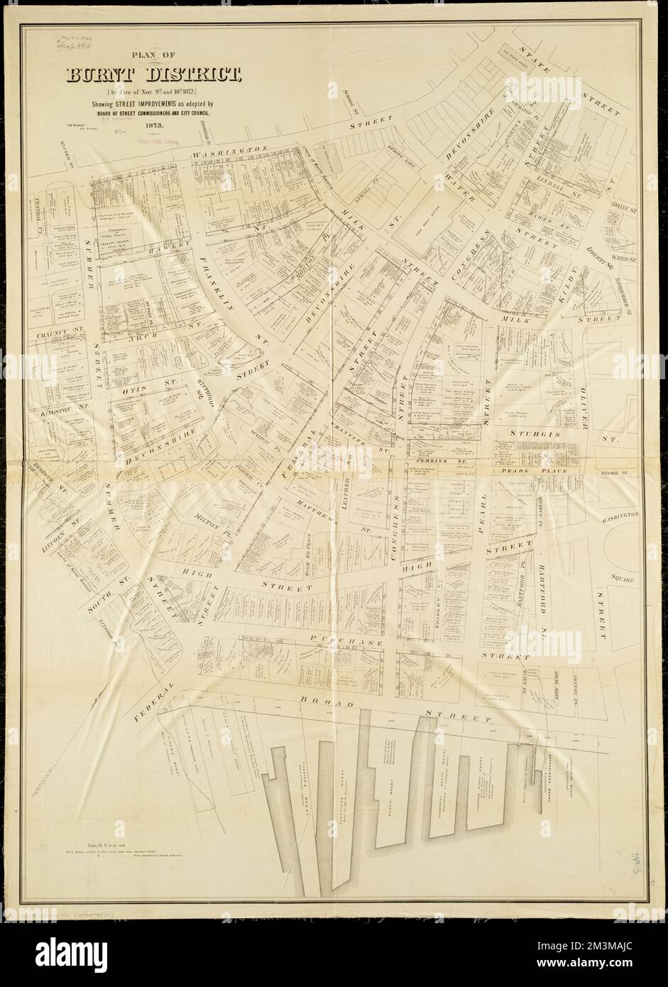 Plan of burnt district by fire of Nov. 9th and 10th, 1872 : showing street improvements as ...