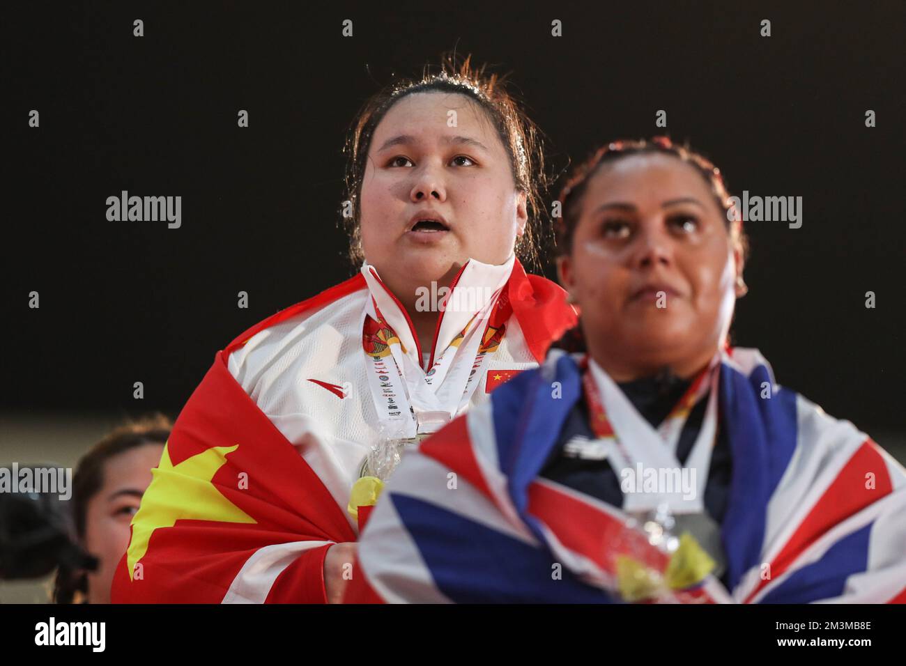 Bogota, Colombia. 15th Dec, 2022. Li Wenwen (L) of China reacts during ...