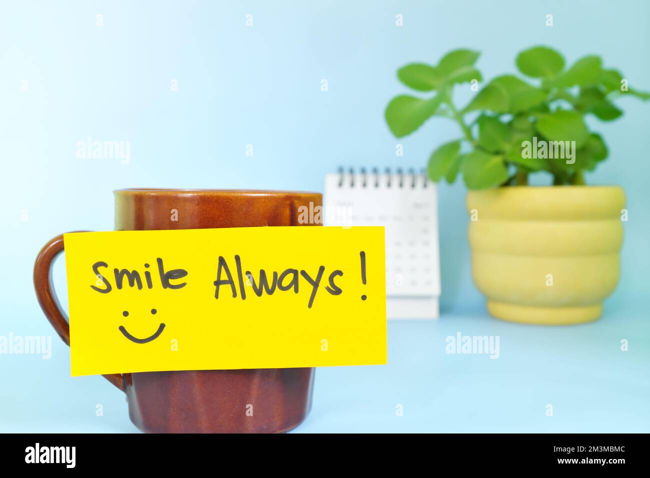 Choose happiness and smile always concept. Selective focus of a cup of ...