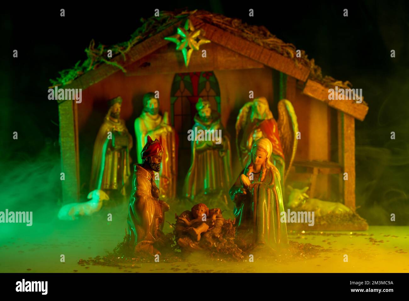 Christmas decorative creche with Holy family. Christmas Jesus in crib ...