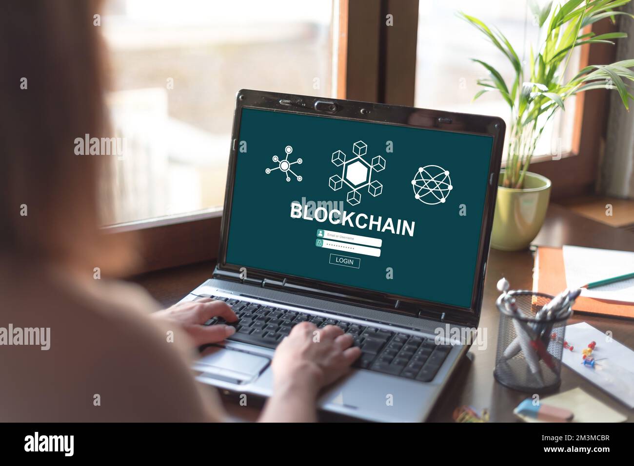 Laptop screen displaying a blockchain concept Stock Photo - Alamy