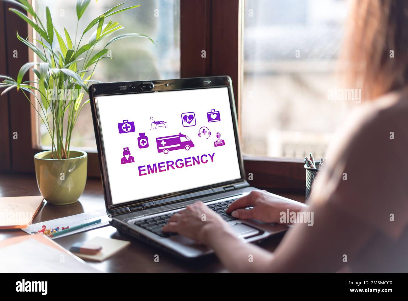 Laptop screen displaying an emergency concept Stock Photo - Alamy