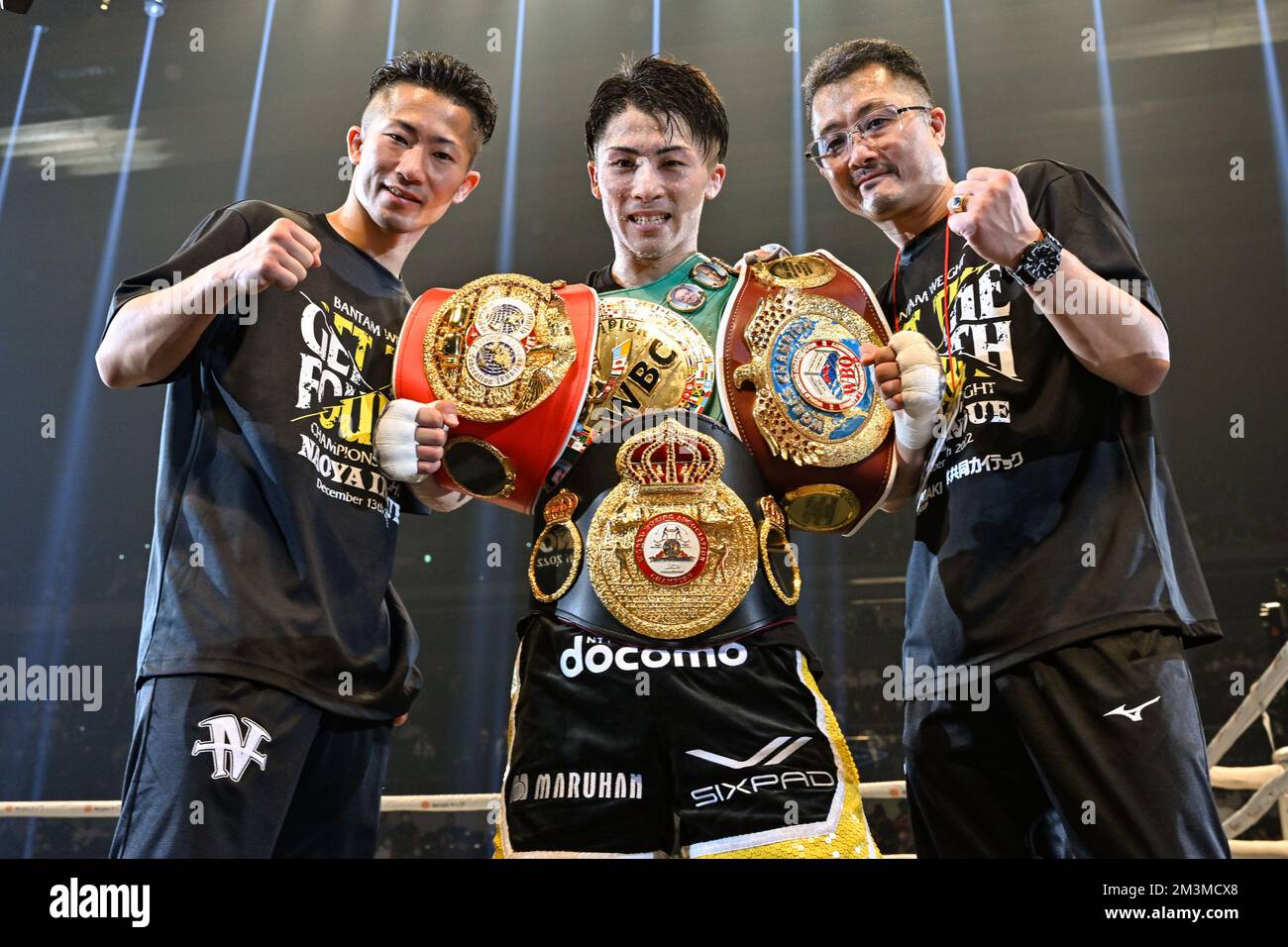 Tokyo, Japan. 13th Dec, 2022. Naoya Inoue (C) of Japan celebrates with ...