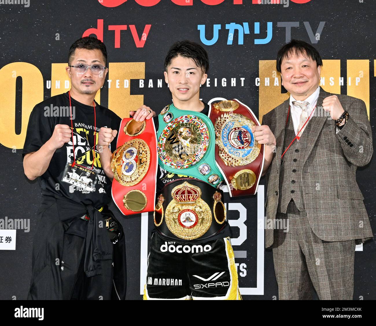 Tokyo, Japan. 13th Dec, 2022. Naoya Inoue (C) of Japan attends a press ...