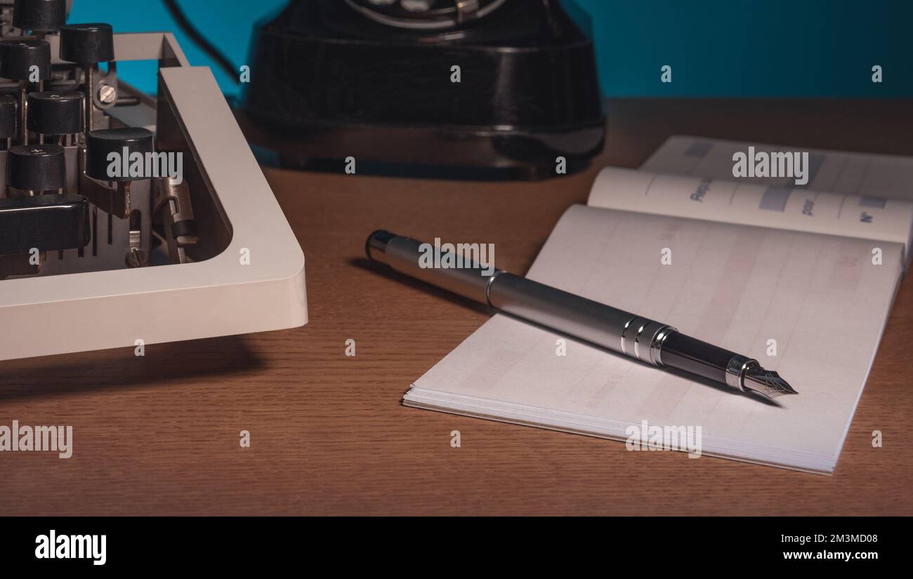 typewriter, old telephone, checkbook, ink pen - retro installation ...