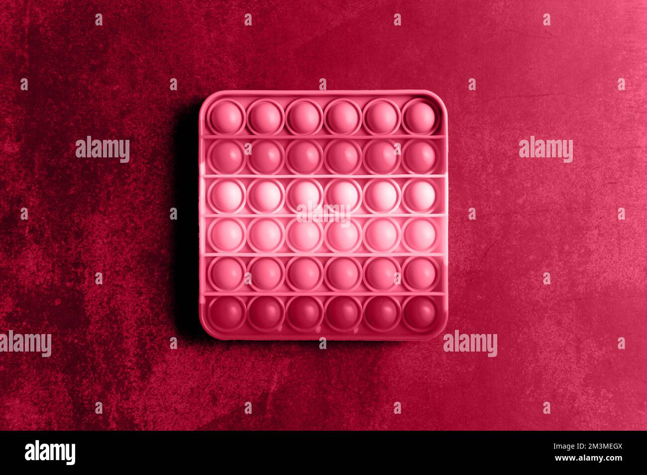 kids anti stress sensory pop it or simple dimple fidget push toy on a ...