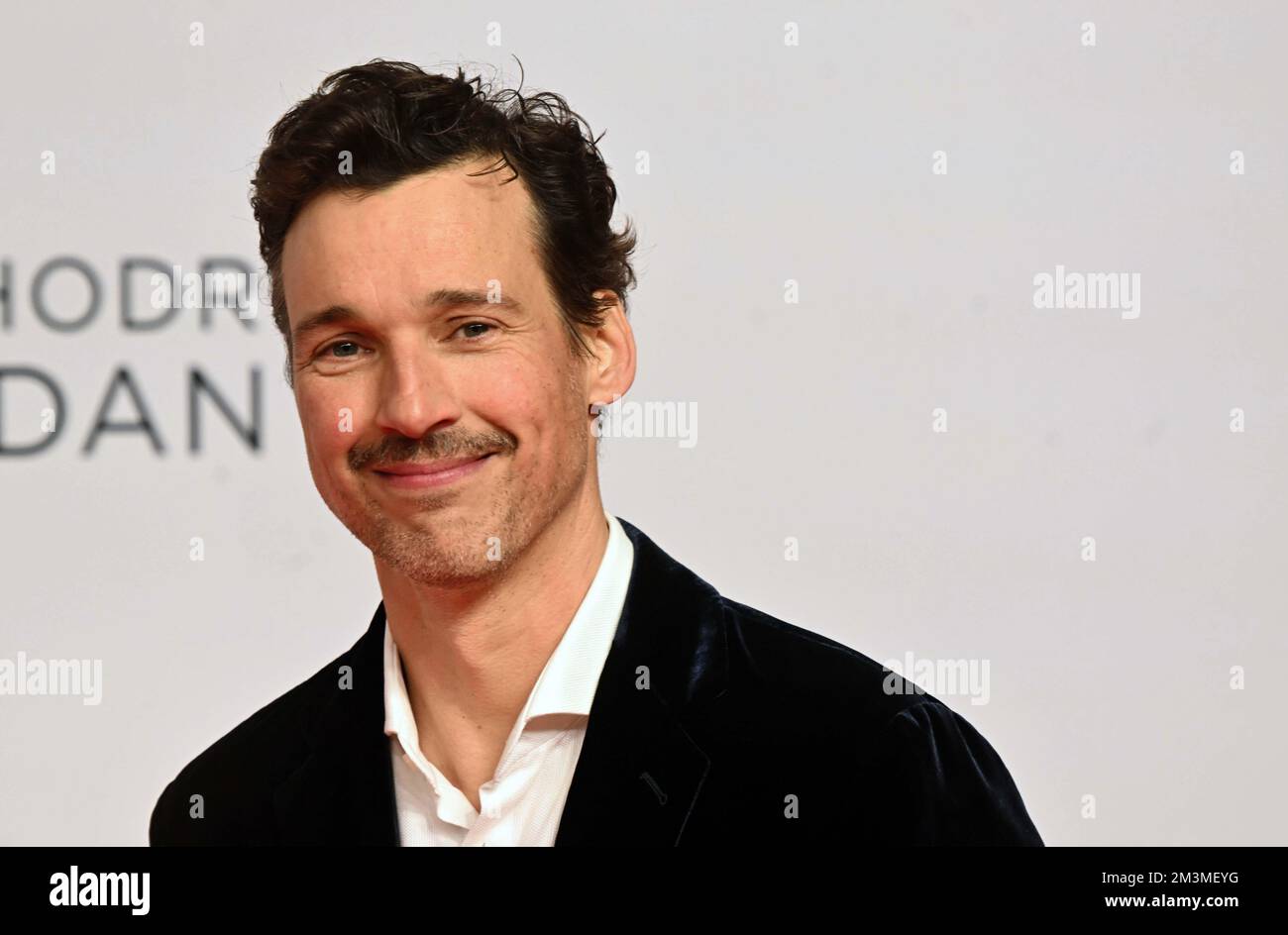 Munich, Germany. 15th Dec, 2022. Actor Florian David Fitz shows off at ...