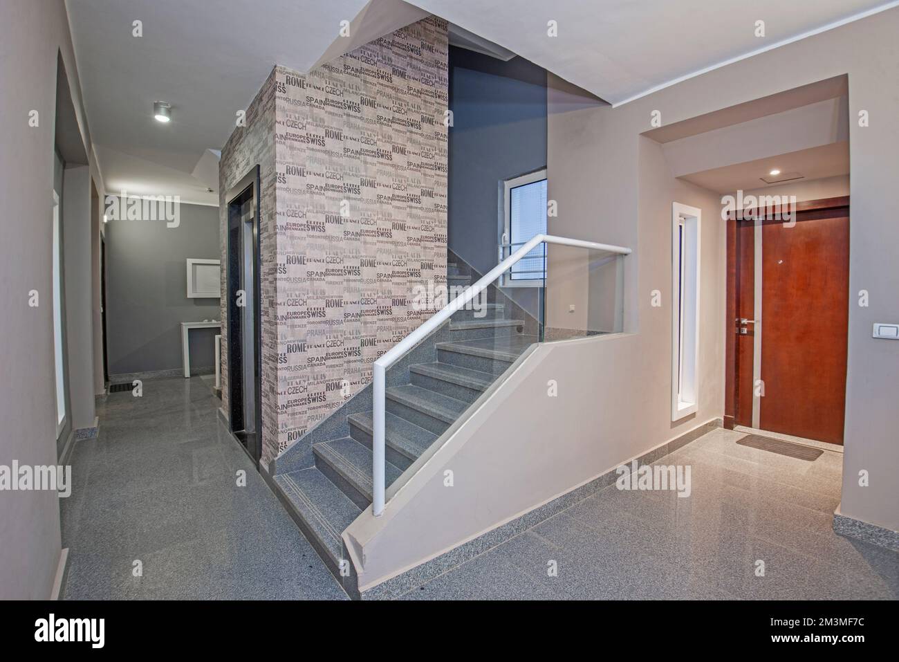 Interior design of apartment building stairwell area with steps and ...