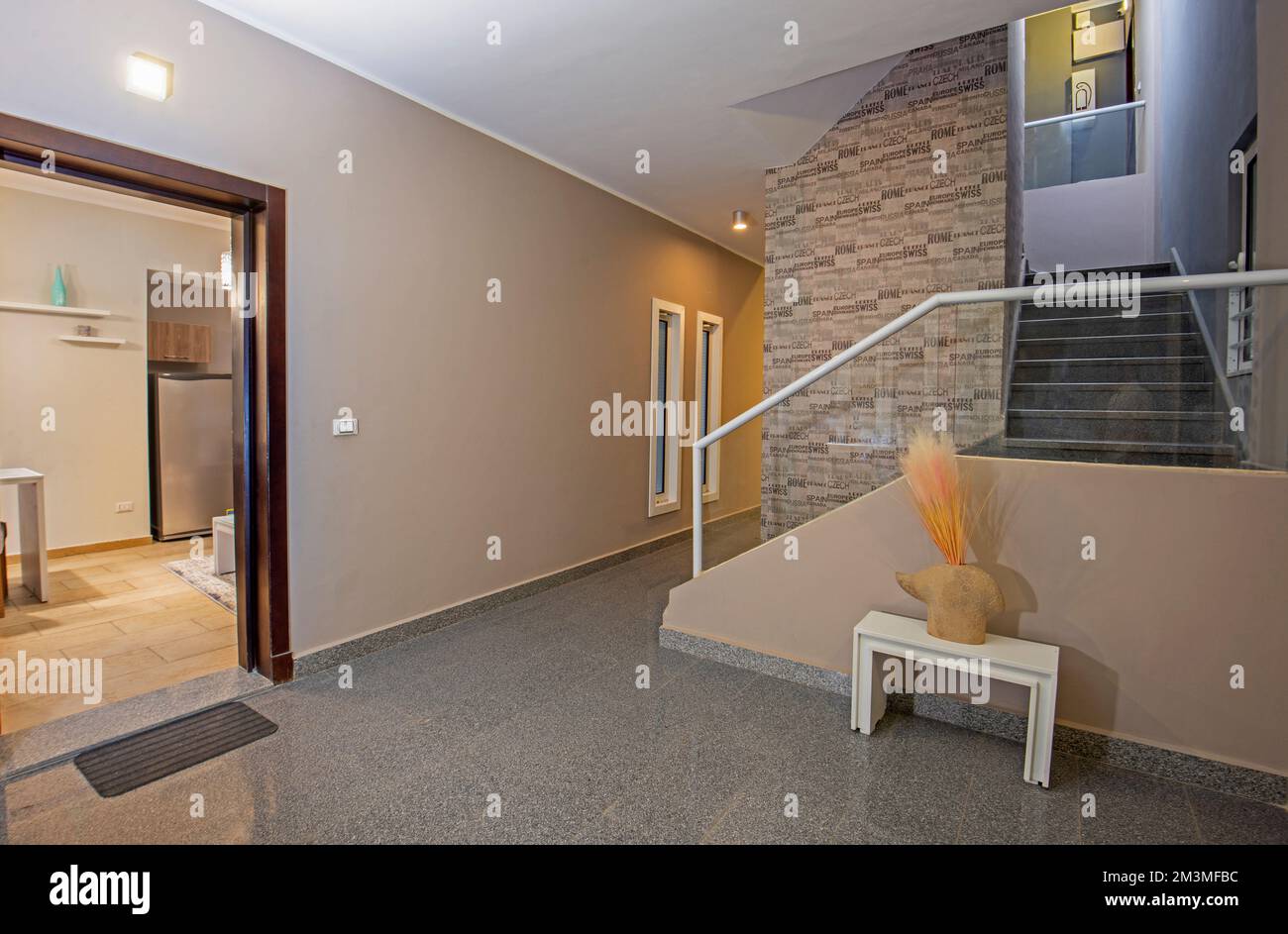 Interior design of apartment building stairwell area with steps and ...