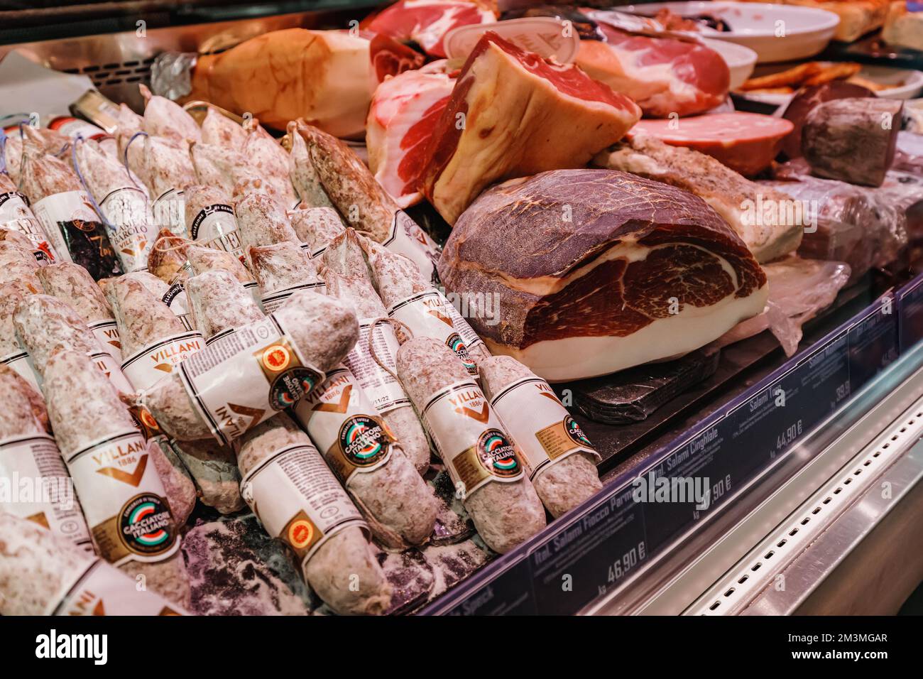 30 July 2022, Cologne, Germany: smoked sorts of sausage and bacon ham ...