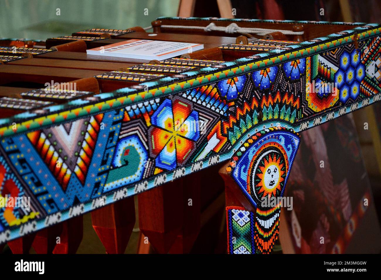 Non Exclusive: a marimba decorated with designs and ornaments made of ...