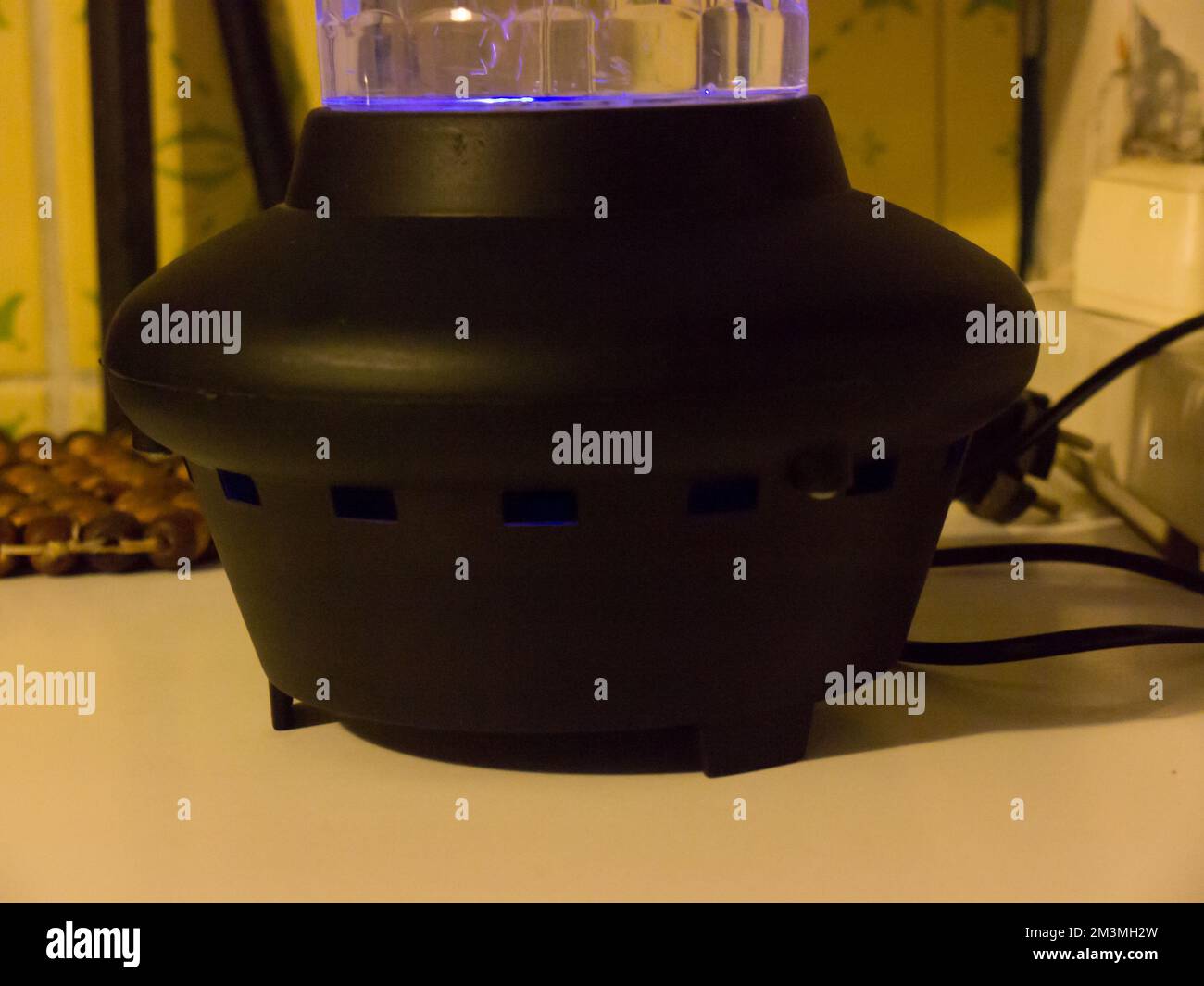 Miniature toy, Fountain with a cup Stock Photo - Alamy