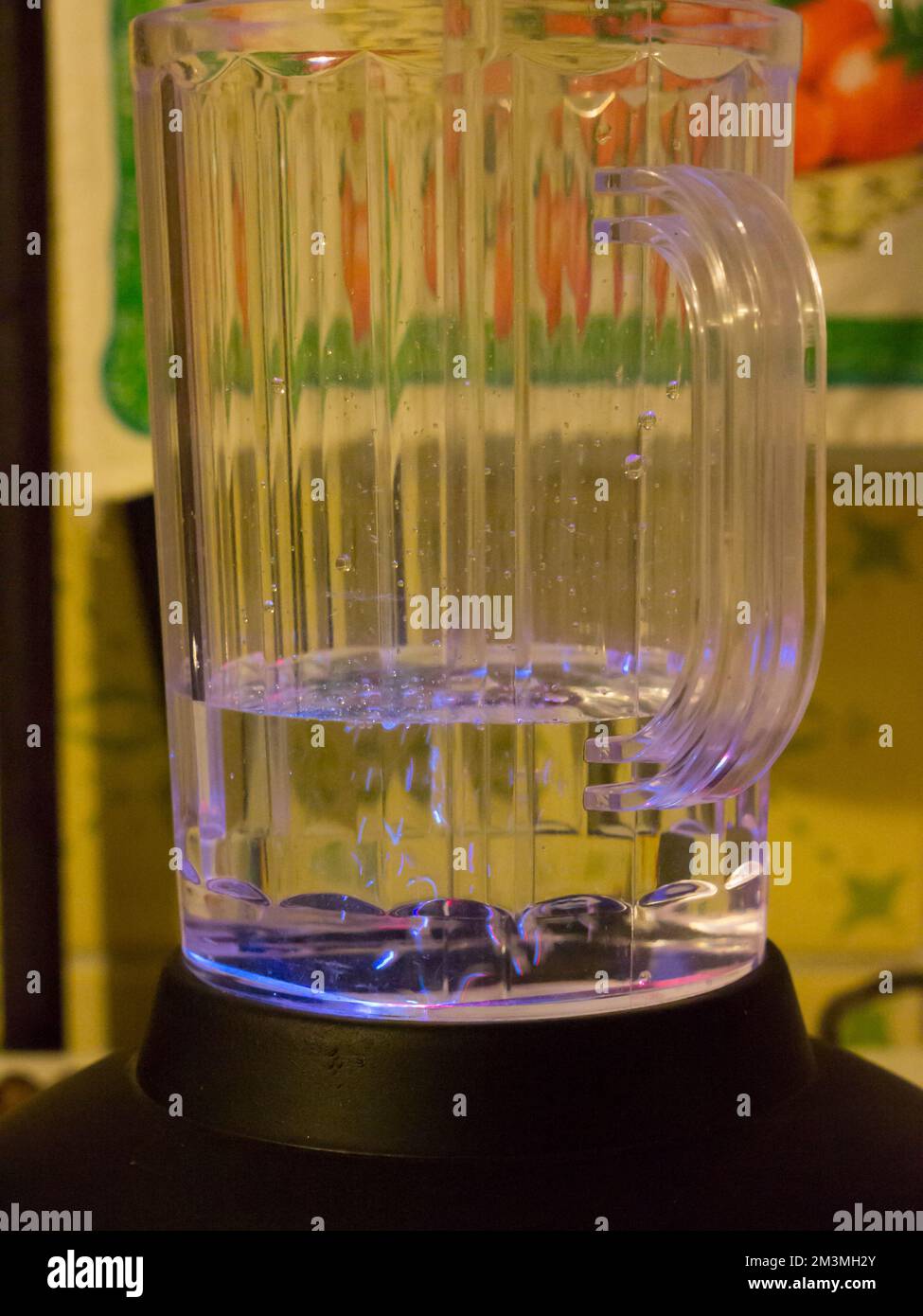 Miniature toy, Fountain with a cup Stock Photo - Alamy