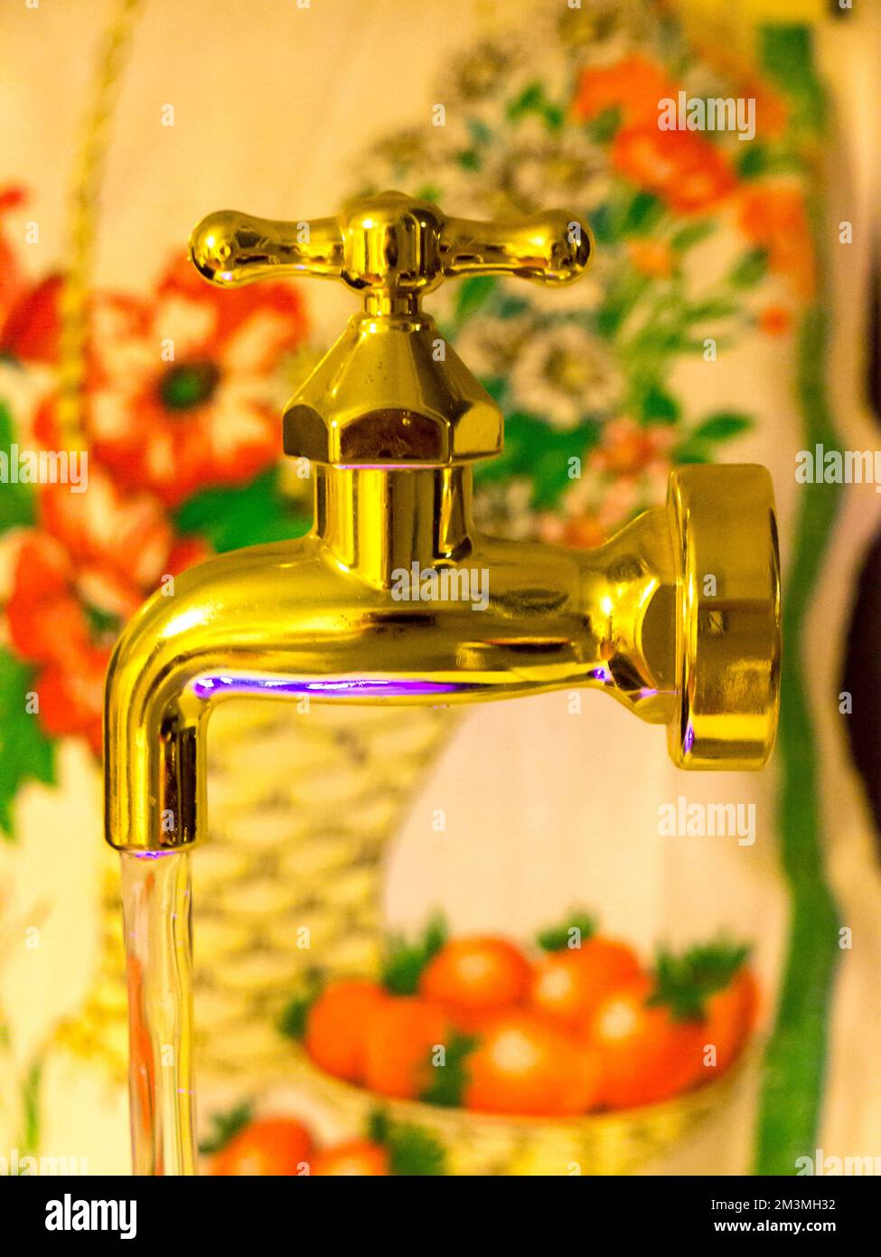 Miniature toy, Fountain with a cup Stock Photo - Alamy