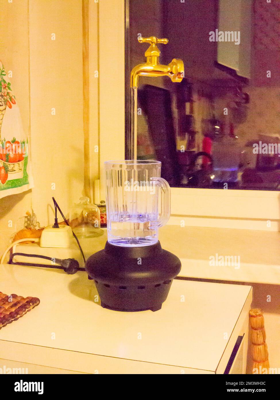 Miniature toy, Fountain with a cup Stock Photo - Alamy