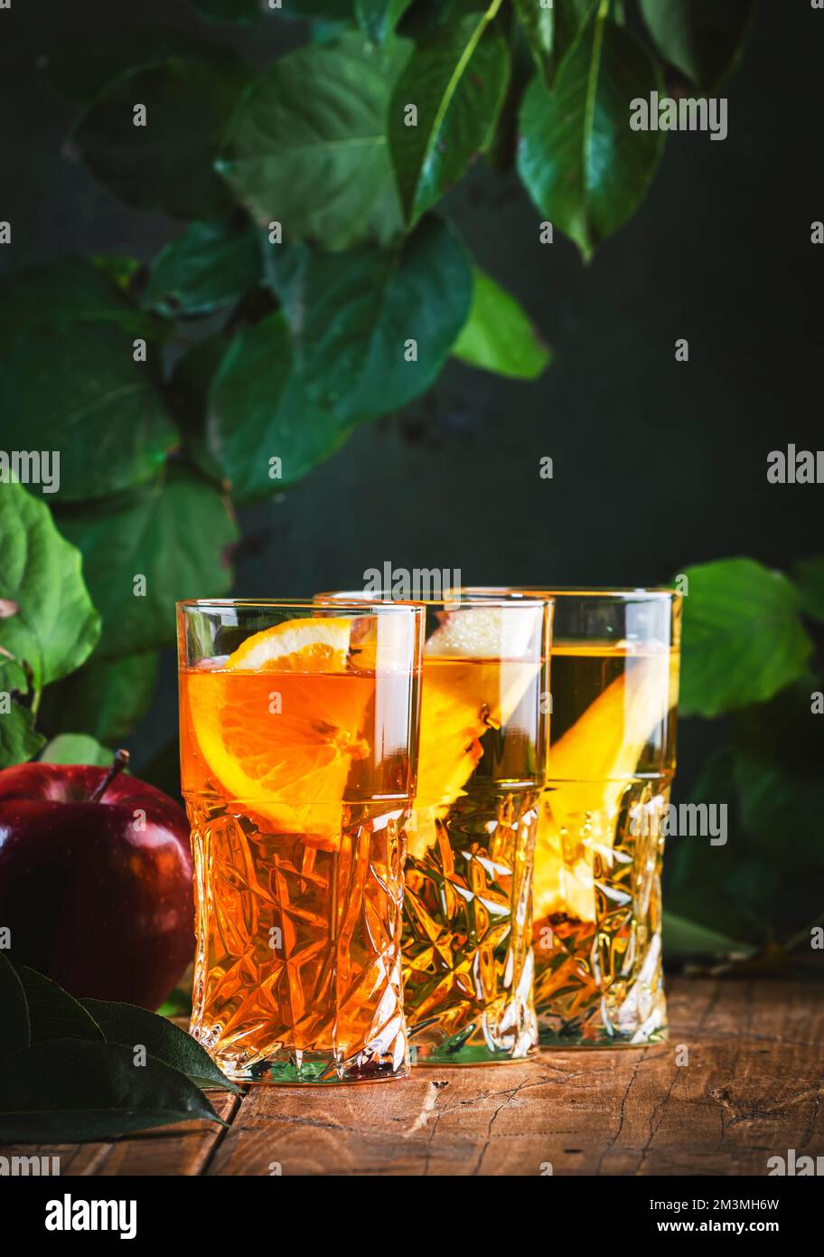 Cider glasses: apple, pear and orange drinks. Fermented low alcohol ...
